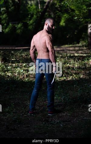 Superhero With Claws Standing Strong Flexing Muscles - Muscular ...