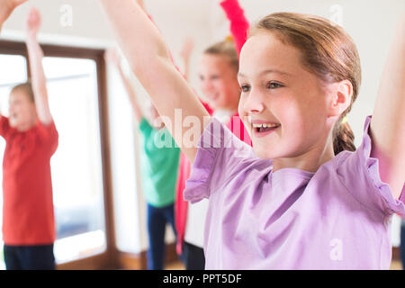 Group Of Children Enjoying Drama Class Together Stock Photo - Alamy