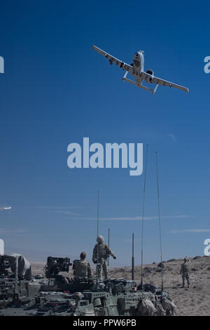 An A-10 Thunderbolt II conducts a close-air-support mission over ...