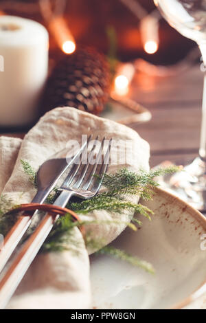 Christmas table setting with empty ceramic plates, traditional ...