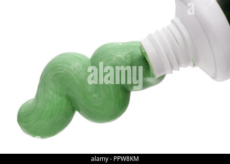 paste tube with squeezed out toothpaste, green and white striped, white ...