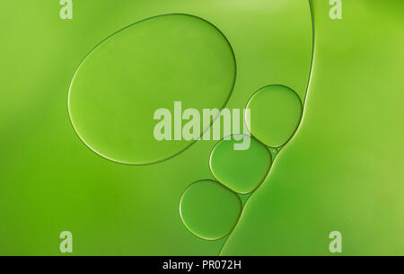 Photo of oil on a water surface with bubbles. Abstract colorful ...