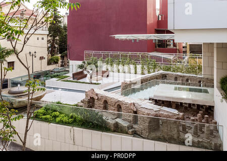 Excavated ruins of Roman bath and labrum included to entrance hall with ...