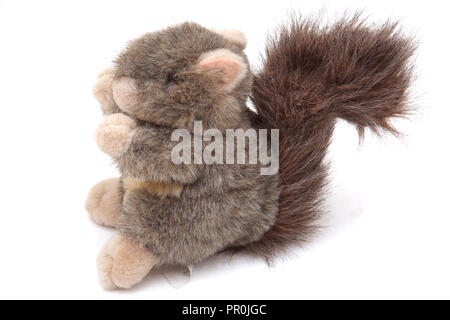 plush toy squirrel with a bushy tail isolated on a white background ...