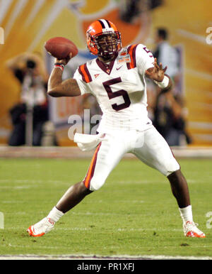 Virginia Tech quarterback Tyrod Taylor breaks for a touchdown in the ...