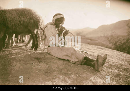 Shepherd playing flute 1925, West Bank, Bethlehem, Israel. Reimagined ...