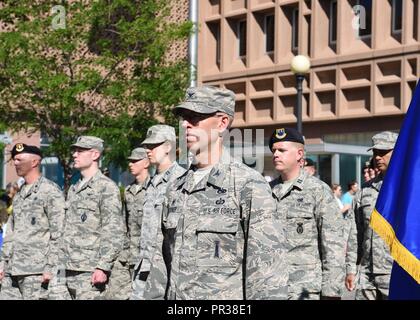 Col. Greg Buckner, 90th Maintenance Group commander, passes the guidon ...