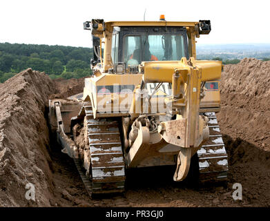 A Caterpillar D8T Bulldozer fitted with a semi universal blade and ...