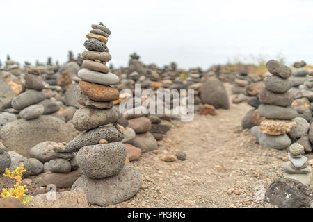 A pile of pebbles is built in the form of a pyramid Stock Photo - Alamy
