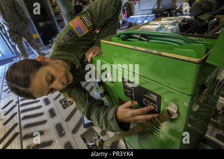 U.S. Air Force Capt. Allison L. Riley, left, a flight nurse with the ...