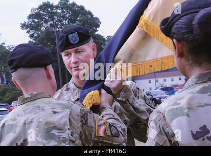 Col. Tamatha Patterson, 23rd Quartermaster Brigade commander, right ...