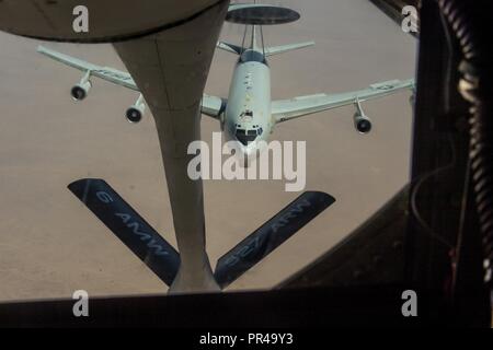 An E-3 Sentry (AWACS) approaches the refueling boom from during a ...