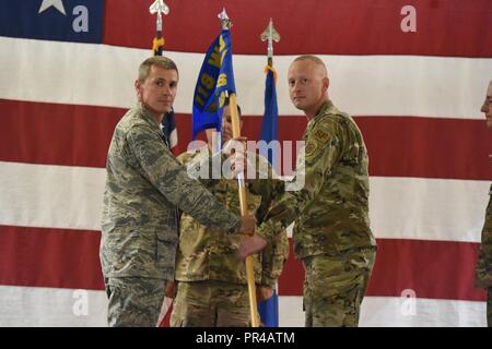 Maj. Greg Goodman, 219th Security Forces Squadron commander briefs ...