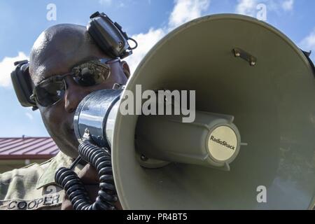 A U.S. Army soldier entering a weapons cache site in Jalalabad ...