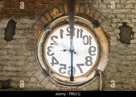 Big old clock embeded at the brick wall Stock Photo - Alamy