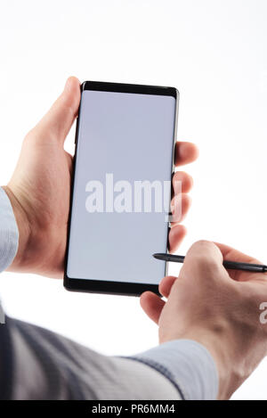 Hand holding digital stylus isolated on white background Stock Photo ...