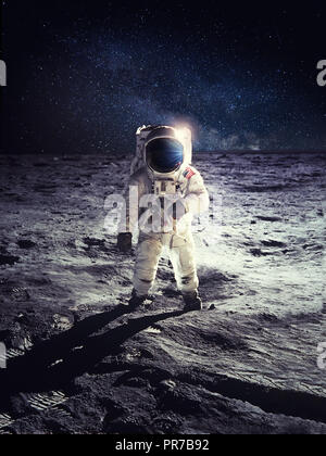 NASA Astronaut standing on moon saluting American flag Stock Photo ...