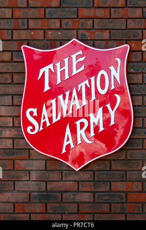 Salvation Army shield logo on a wall Stock Photo - Alamy