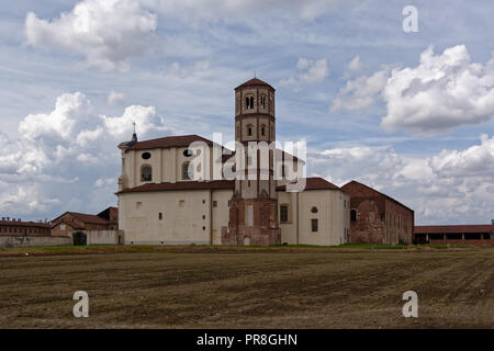 Santa Maria di Lucedio abbey surrounded by plowed fields Stock Photo ...