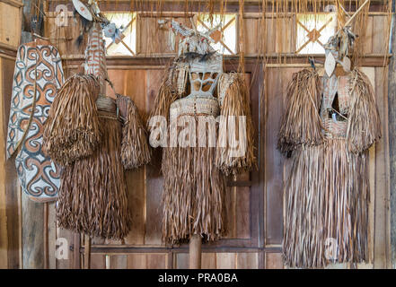 Collection of traditional grass skirts indigenous women wear hanging on ...