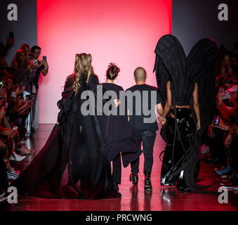 Collection by Namilia (Nan & Emilia). A model waits backstage before ...