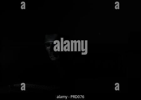 Black mask in the dark secretive ritual and mystery Stock Photo - Alamy