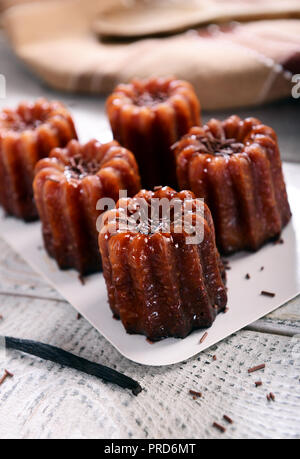 Caneles de bordeaux - traditional French sweet dessert Stock Photo - Alamy