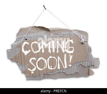Coming Soon! handwritten on a white background Stock Photo - Alamy