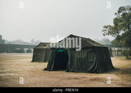 camouflage military army base tent at open day Stock Photo - Alamy