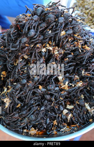 Fried Tarantulas at an open air market, fried spider is a regional ...