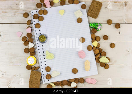 Notepad and traditional dutch candy for celebration of Sinterklaas ...