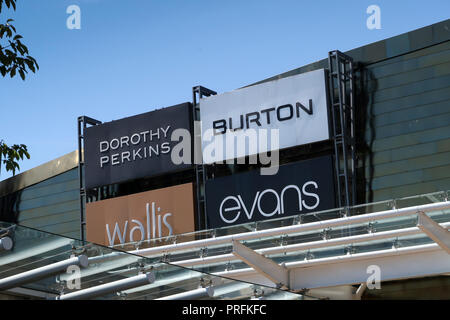 Retail shop signs at Glasgow Fort shopping centre Stock Photo - Alamy