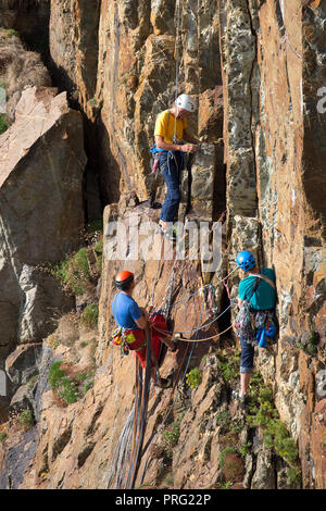 Rock climbing on the Three Cliffs at Three Cliff Bay, South Wales Stock ...