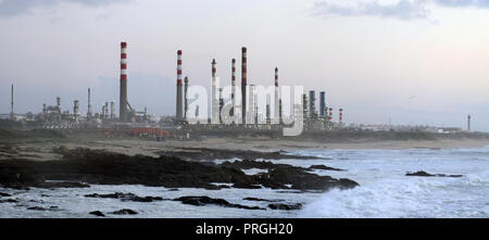 Big oil refinery near a city street at dawn. Photo from 2011 Stock ...