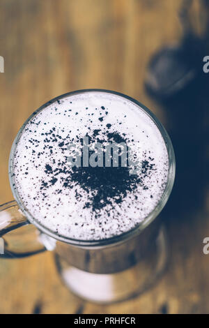 BLACK GOTH/GOTHIC CHARCOAL LATTE. Autumn Halloween coffee drink. Close ...