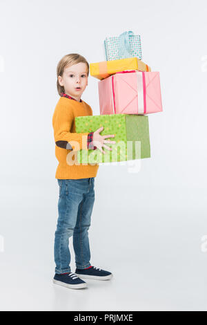 Surprised boy with wrapped box isolated on white Stock Photo - Alamy