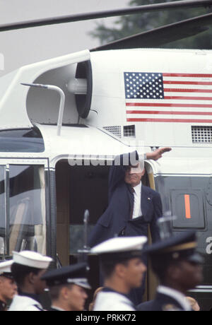 Former President Richard Nixon waves as he boards helicopter after ...