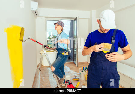 Couple renovate their living room from white to yellow with paint stick ...