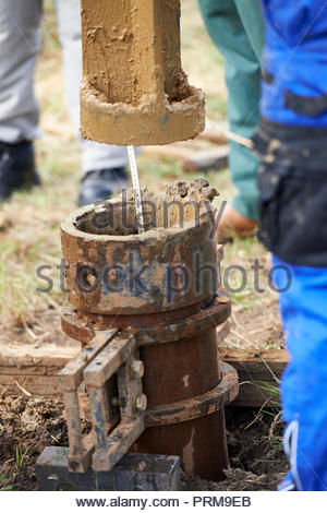 A cable percussion borehole drilling rig set up, ready to work Stock ...