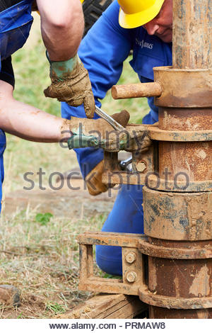 A cable percussion borehole drilling rig set up, ready to work Stock ...