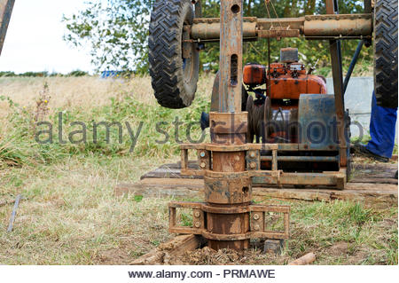 A cable percussion borehole drilling rig set up, ready to work Stock ...