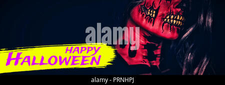 Digital composite image of happy halloween text in spooky cemetery at ...