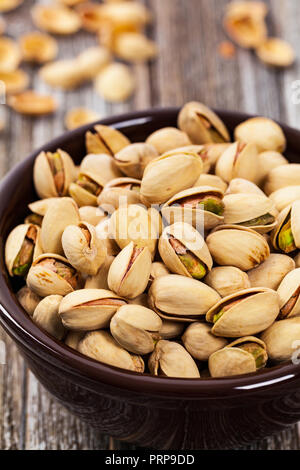 Sea Salt Roasted Pistachios Background. Macro. Selective focus Stock Photo - Alamy