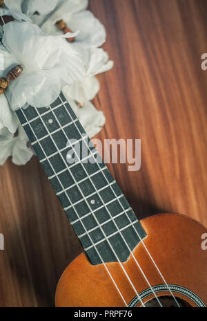 closeup photo of a ukulele against a Hawaiian background Stock Photo ...