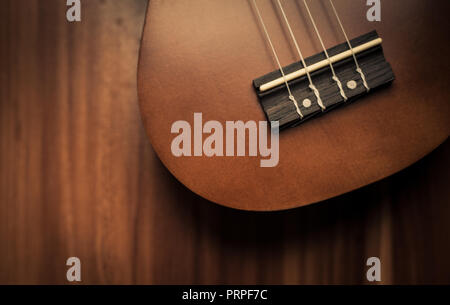 closeup photo of a ukulele against a Hawaiian background Stock Photo ...