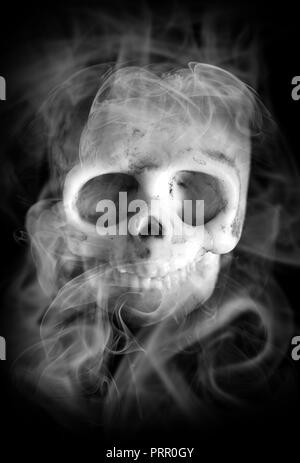 Scary skull emerging from a cloud of smoke . Halloween background Stock ...