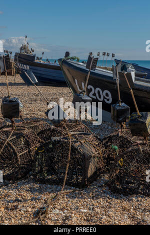 Bognor regis beach with traditional open lobster and crab fishing boat ...