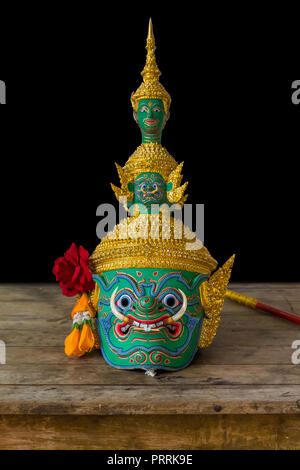 a traditional thai demon wooden mask on sale as a souvenir in the Stock ...