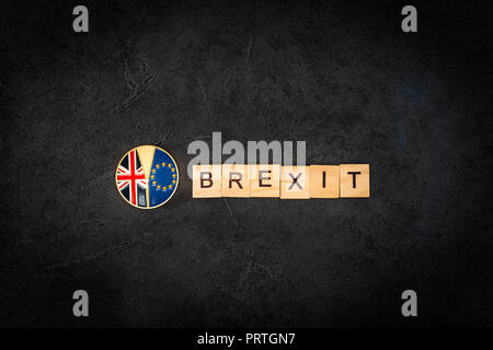 Brexit Concept - National Flag Gold Coin and English Words Stock Photo ...