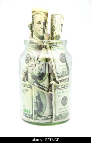 Tickets $100 in a glass jar Stock Photo - Alamy